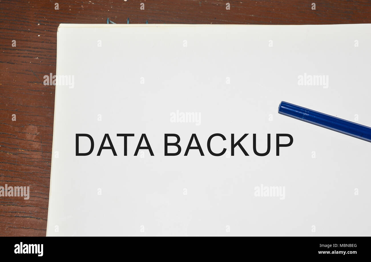 data backup written on white paper Stock Photo - Alamy