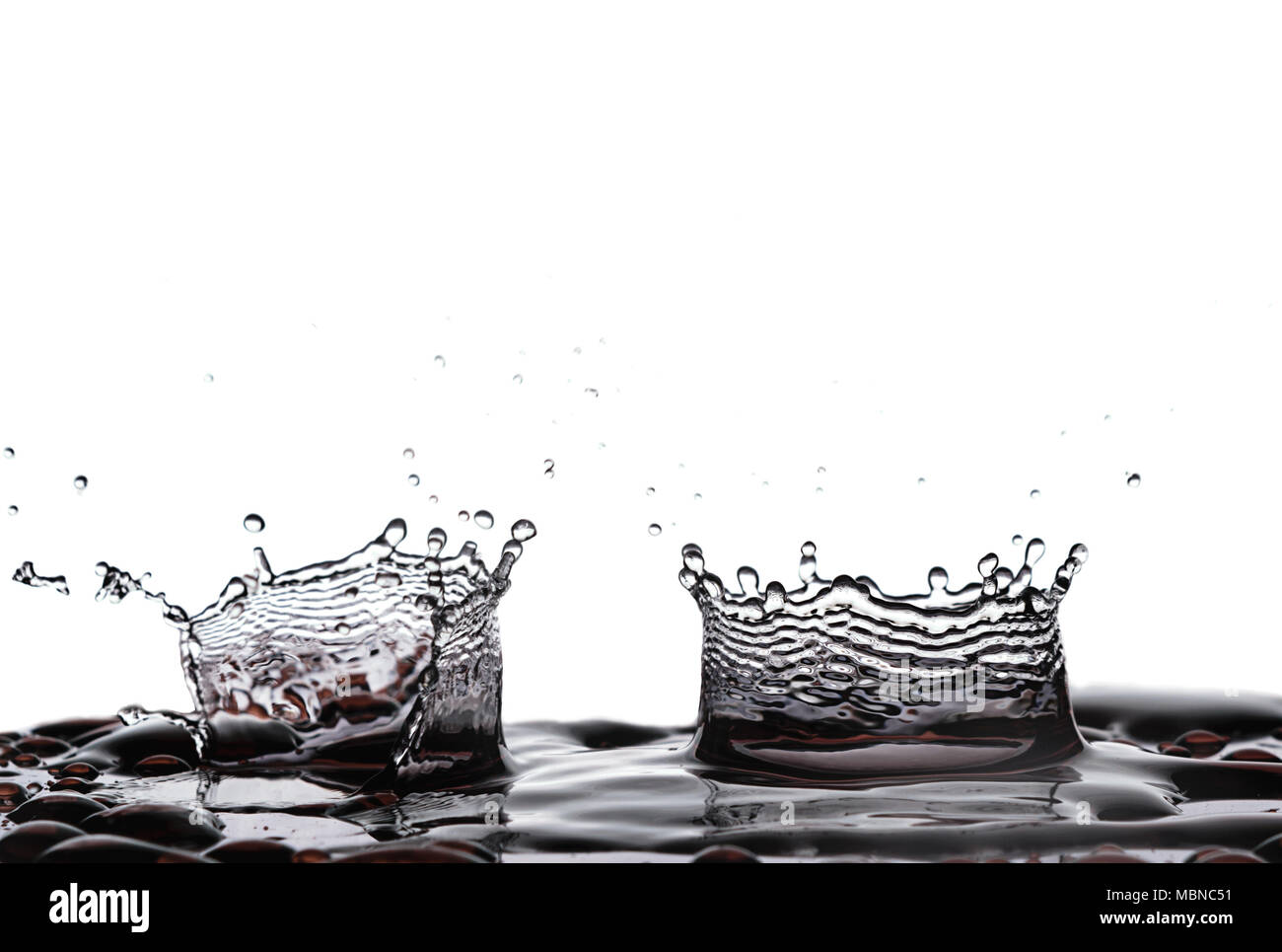two water splash isolate white background Stock Photo - Alamy