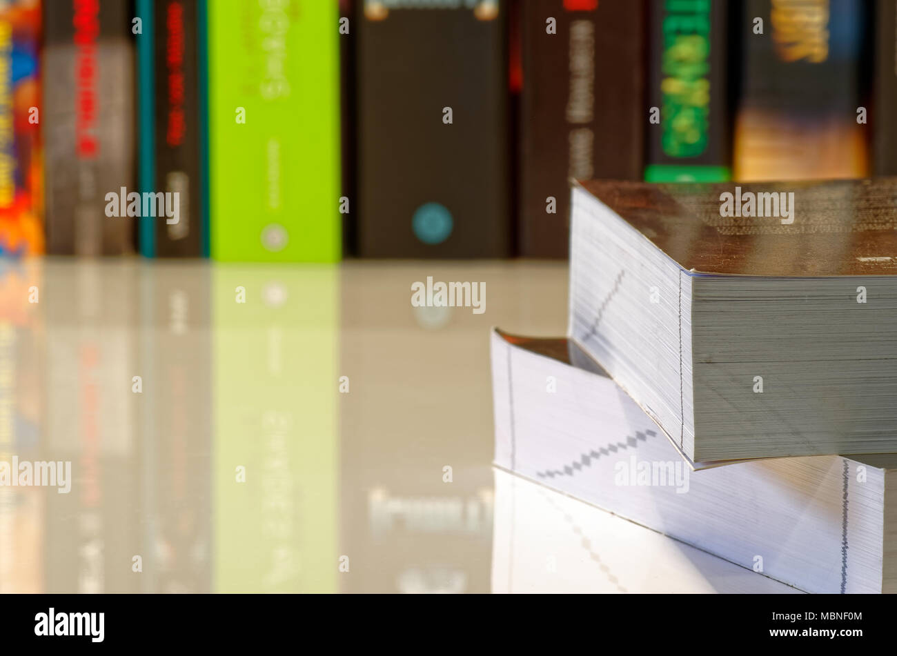 Books lying on a table hi-res stock photography and images - Alamy