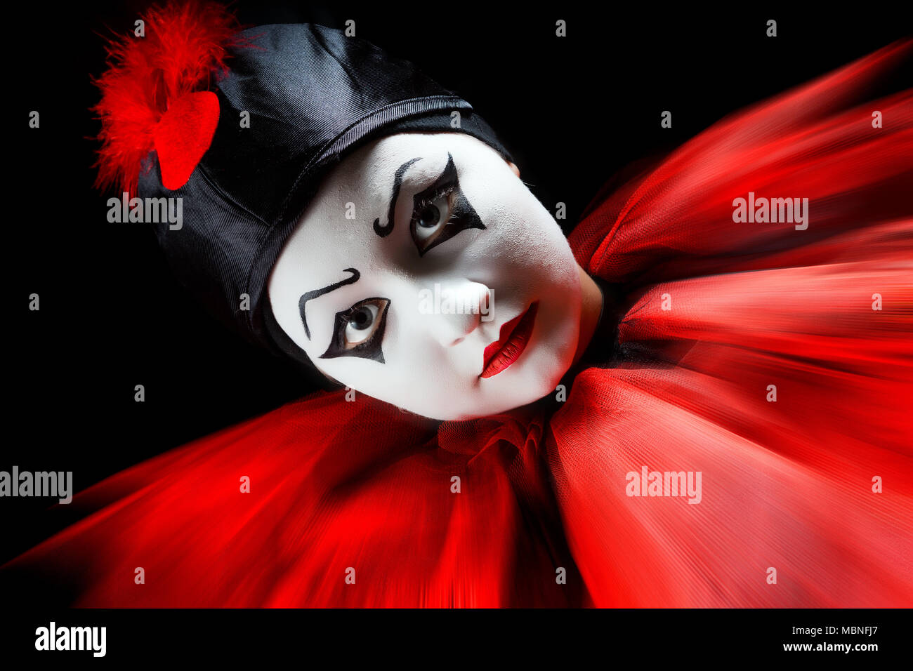 Flashing portrait in red and black of a mime pierrot clown Stock Photo ...