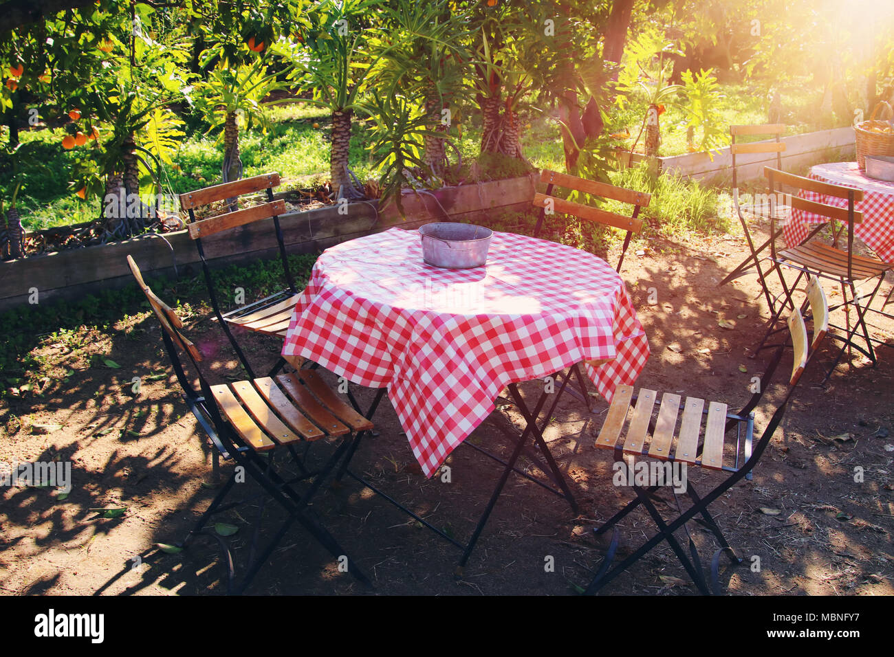 Image of rural restaurant with vintage table and chairs outdoors Stock ...