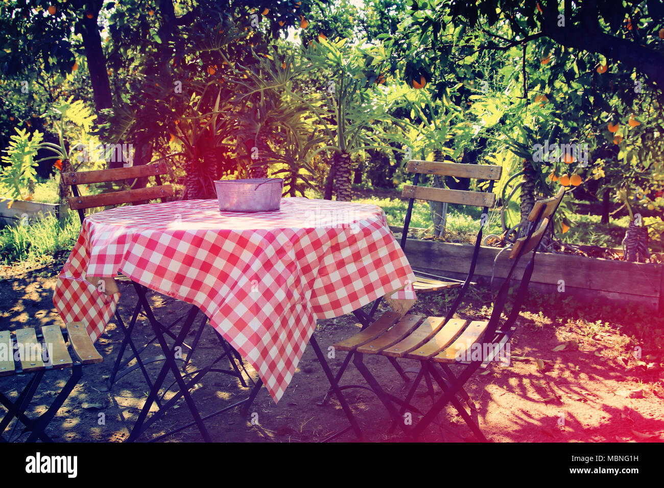Image of rural restaurant with vintage table and chairs outdoors Stock ...