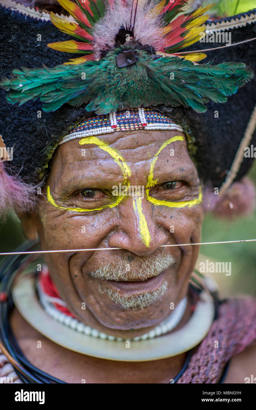 Close-up portrait of a Huli wigman with ceremonial headdress, Tari ...