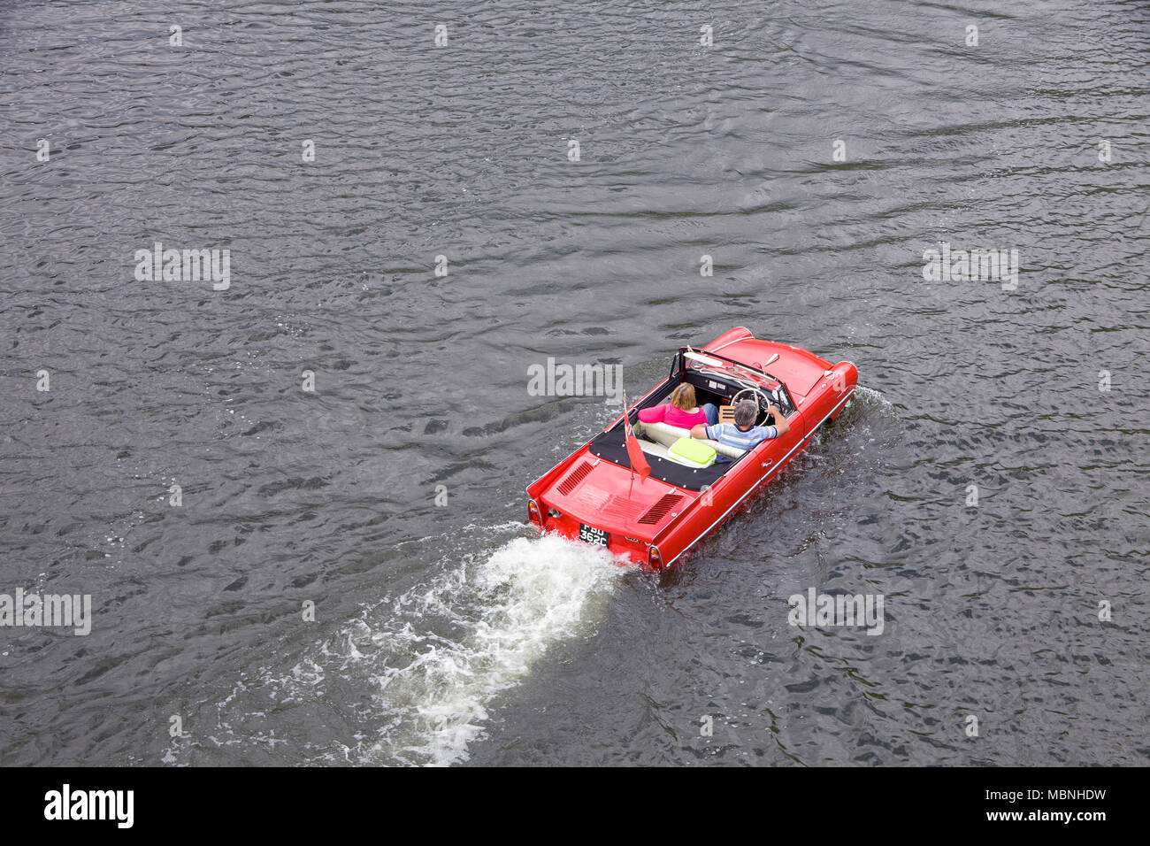 Amphic car, a german amphibious vehicle driving on Moselle river at ...