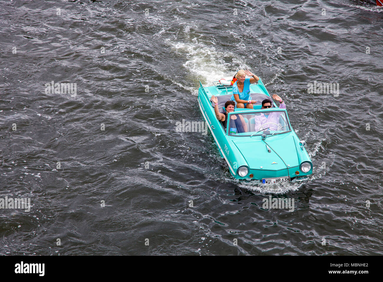 Amphic car, a german amphibious vehicle driving on Moselle river at ...