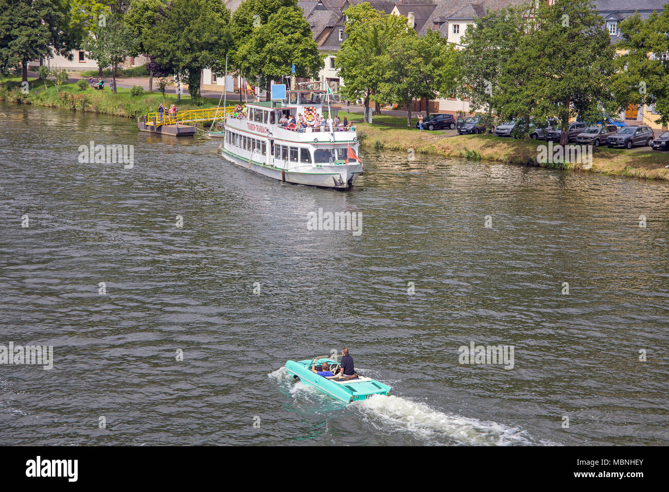 Amphic car, a german amphibious vehicle driving on Moselle river at ...