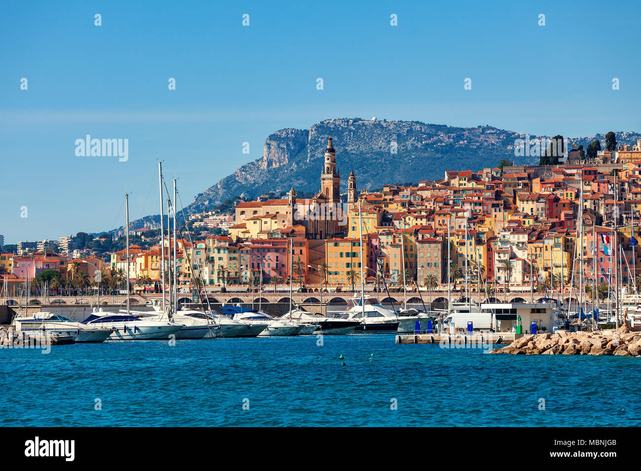 View of small harbor with yachts and old colorful houses of the Old ...