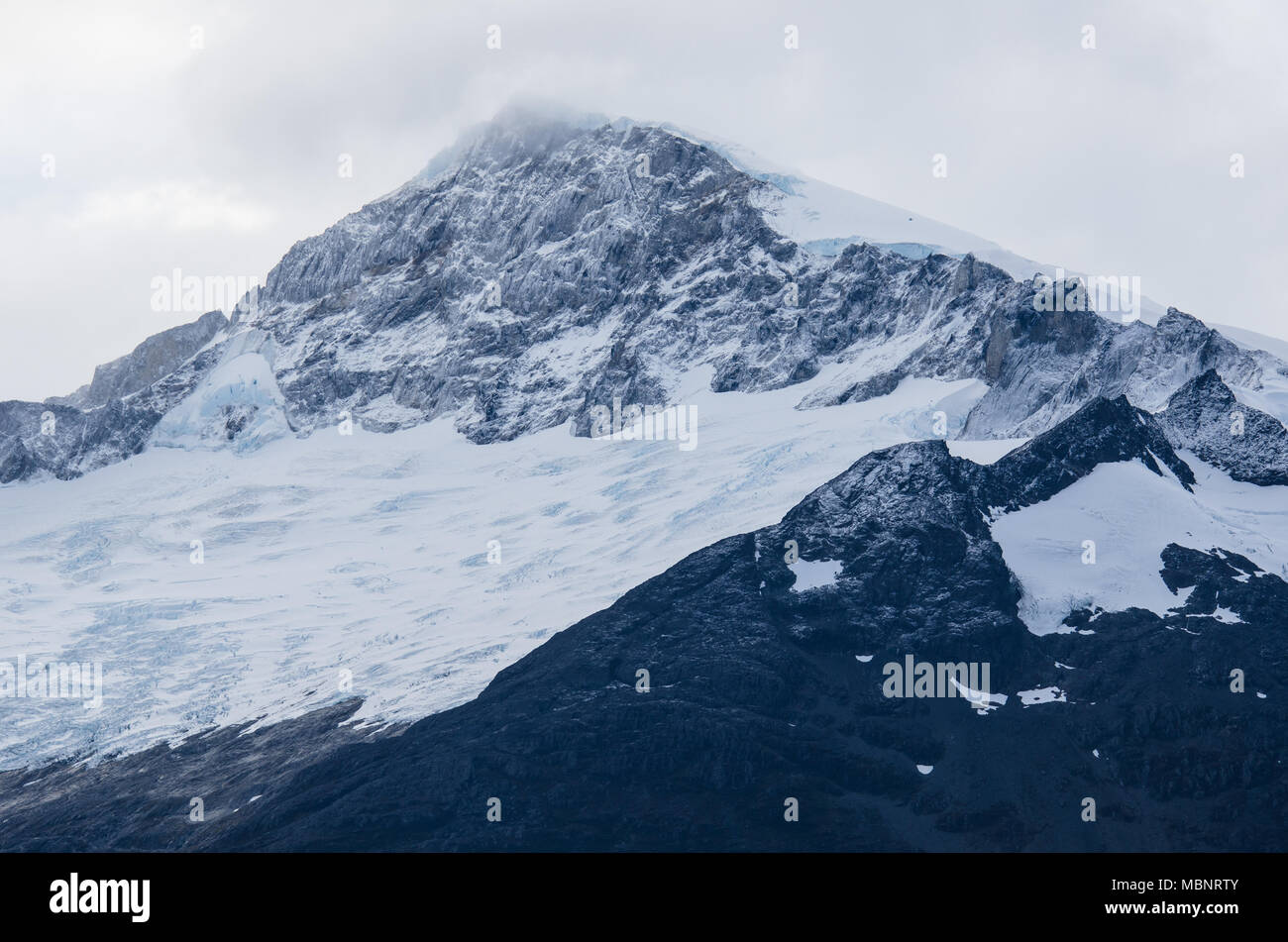 Snow cover mountain top. Glacier mountain summit. Snowy cover mountain ...