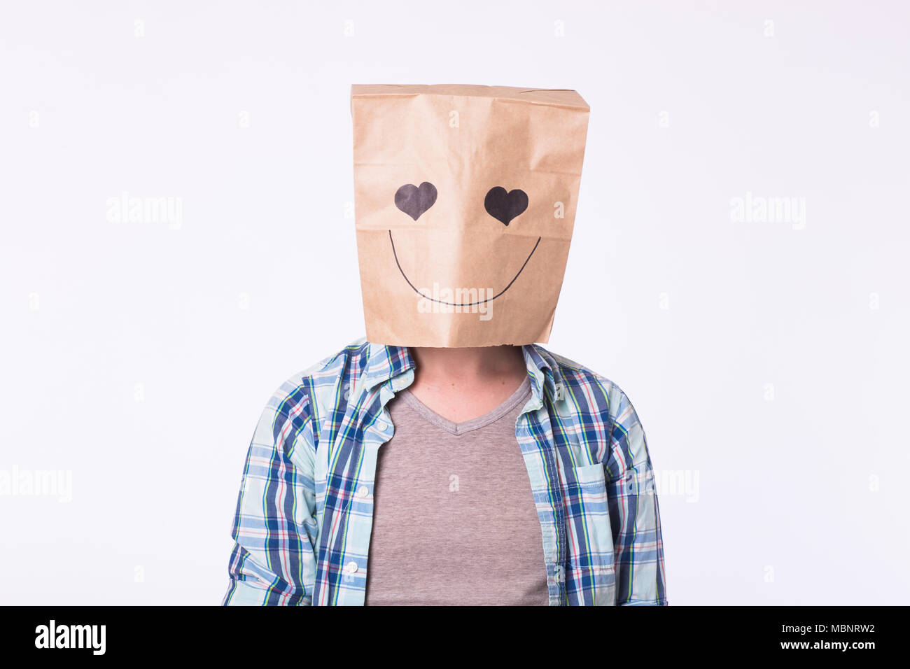 Love, emotion and relationship concept - Man with cardboard box on his ...
