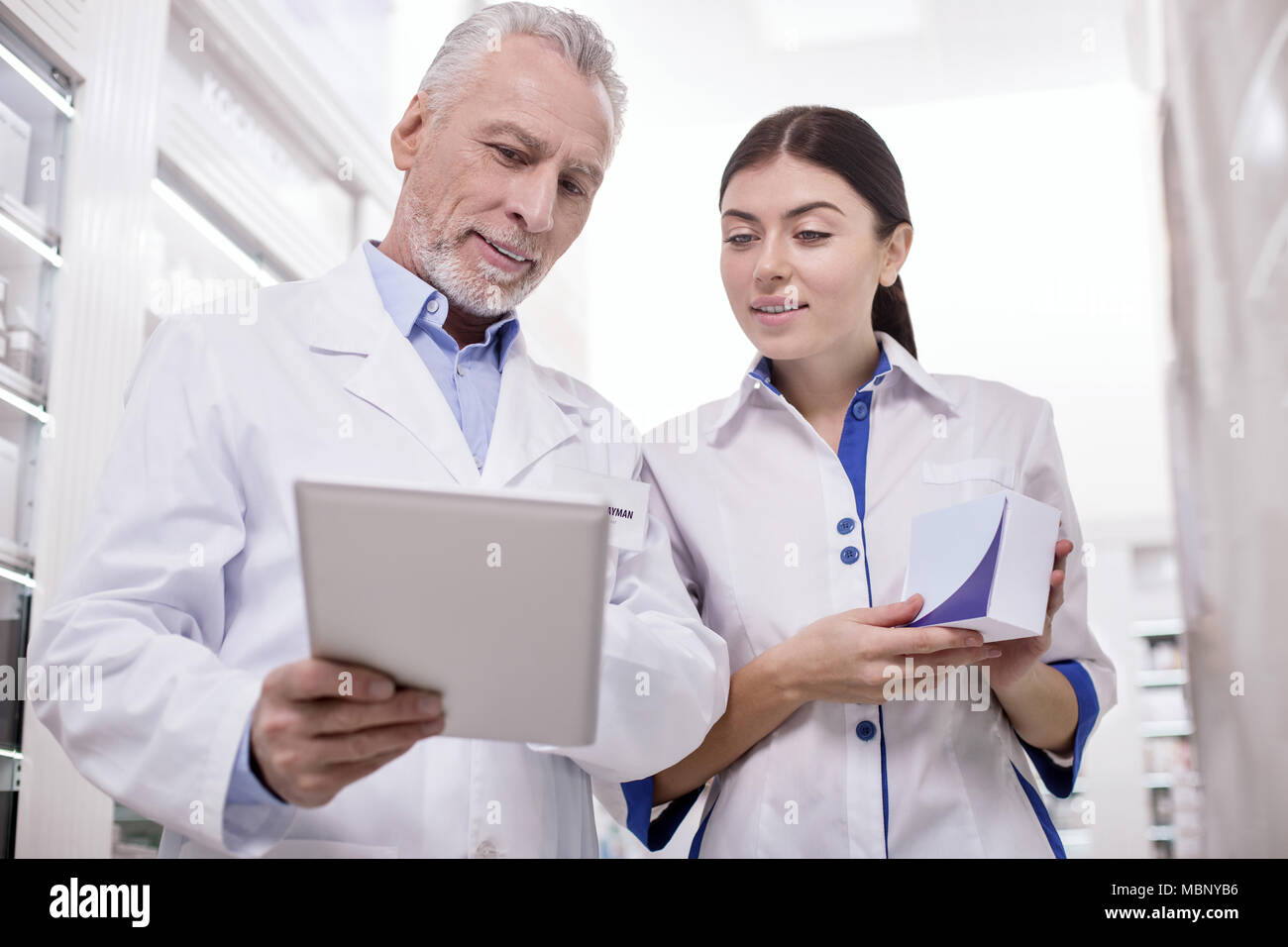 Asking colleagues for help hi-res stock photography and images - Alamy