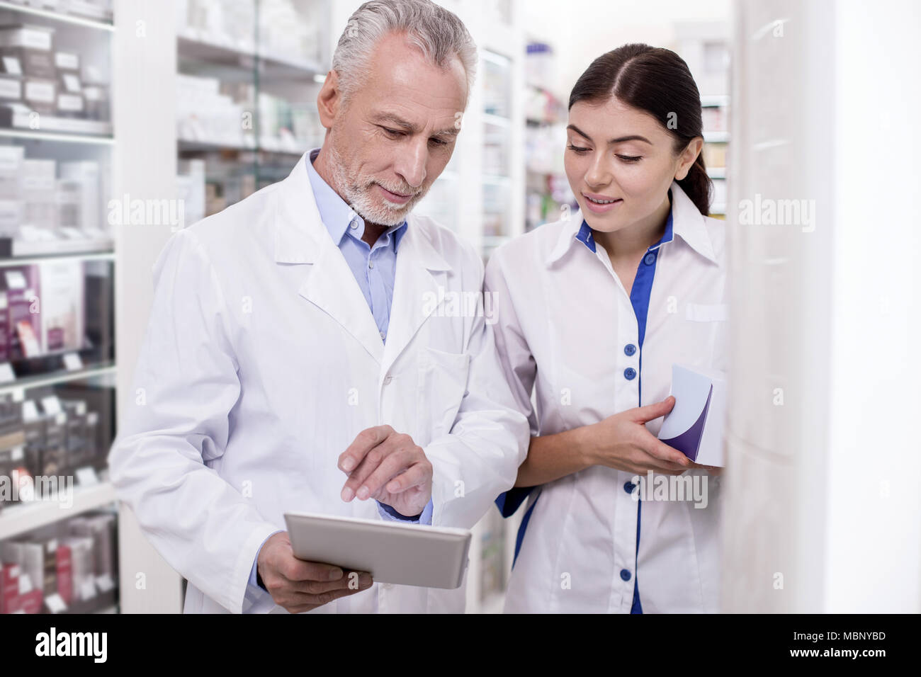 Advising colleague hi-res stock photography and images - Alamy