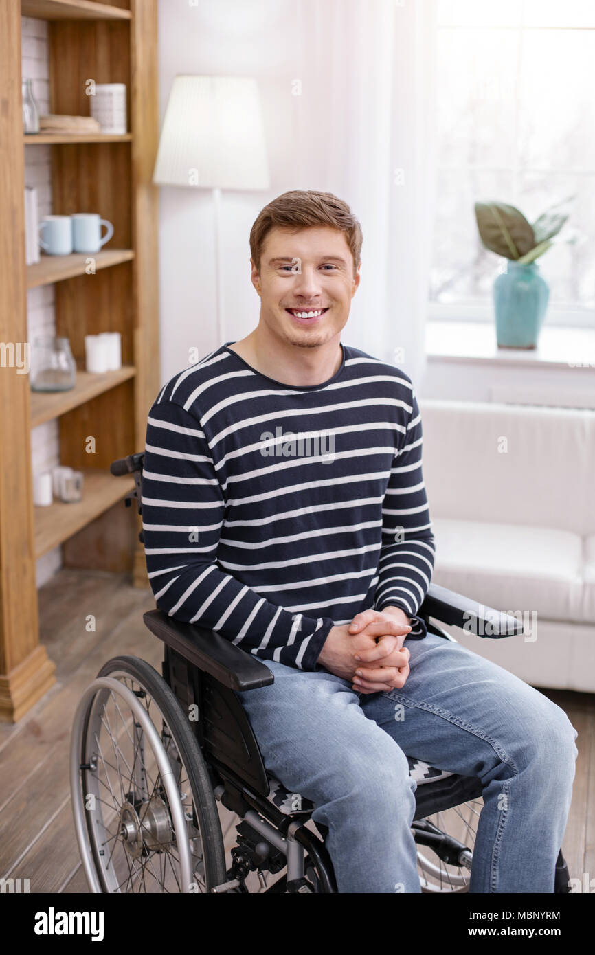 Handsome young man being paralyzed Stock Photo - Alamy