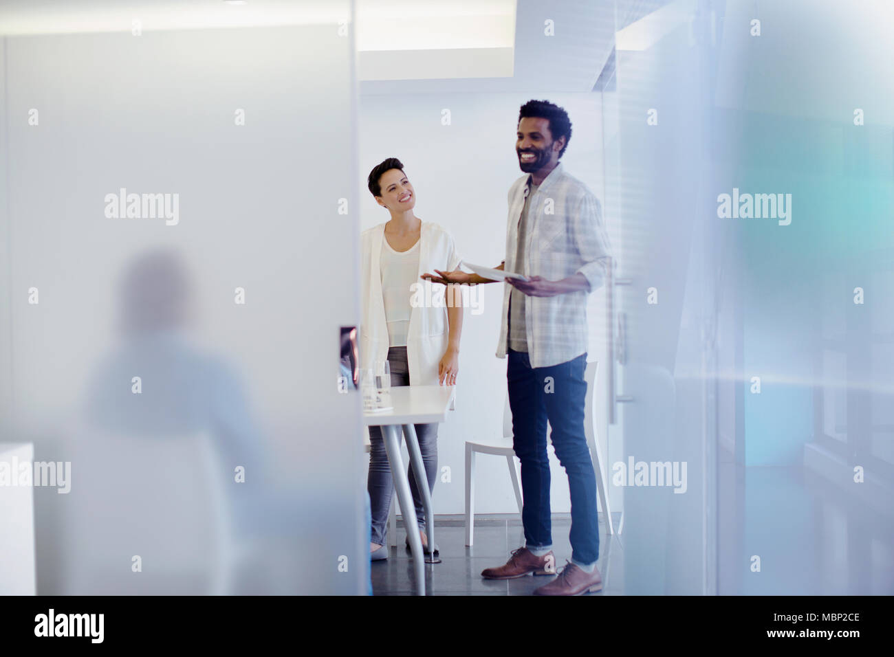 Creative business people talking in conference room meeting Stock Photo ...