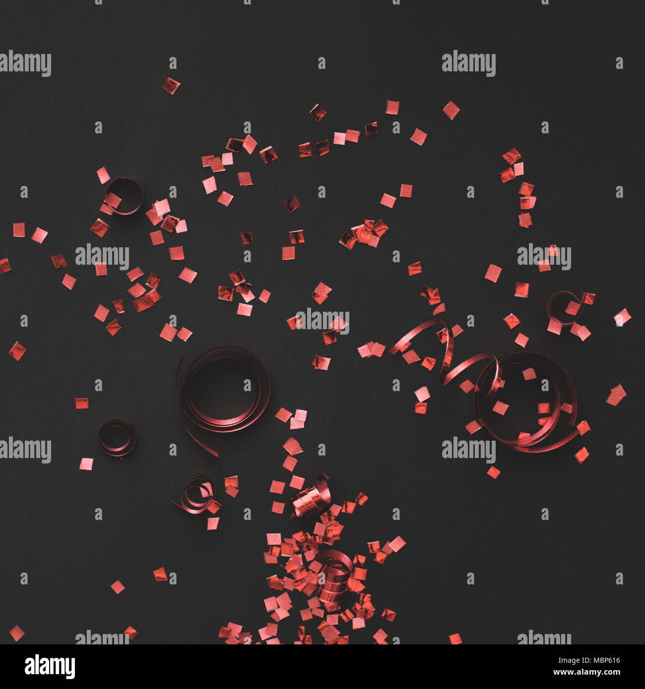 red confetti on black Stock Photo - Alamy