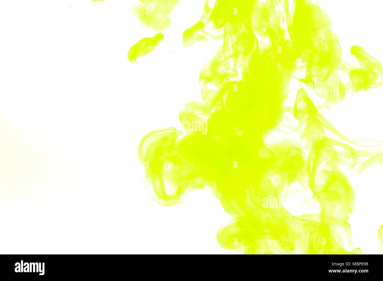 color dissolved in water with white background Stock Photo - Alamy