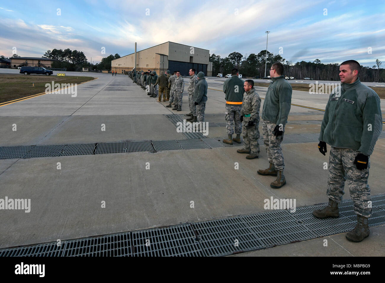 Team Moody Airmen stand in a line on the flight line during a foreign ...