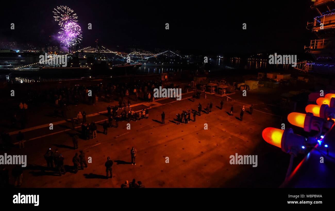 180101-N-AC117-099 YOKOSUKA, Japan (Jan. 1, 2018) Sailors and guests ...