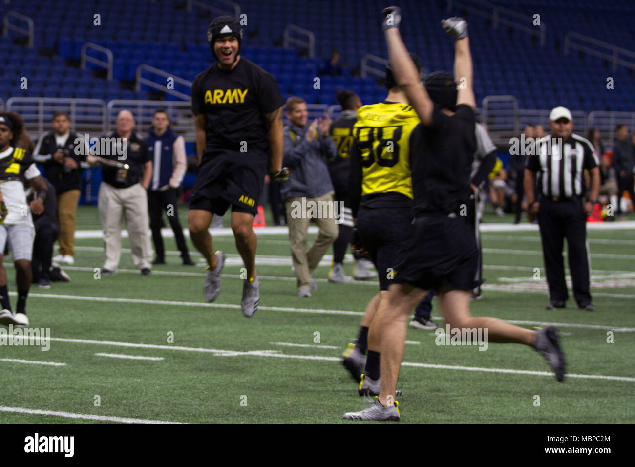 U.S. Army Soldiers celebrate a touchdown during a friendly 7-on-7 ...