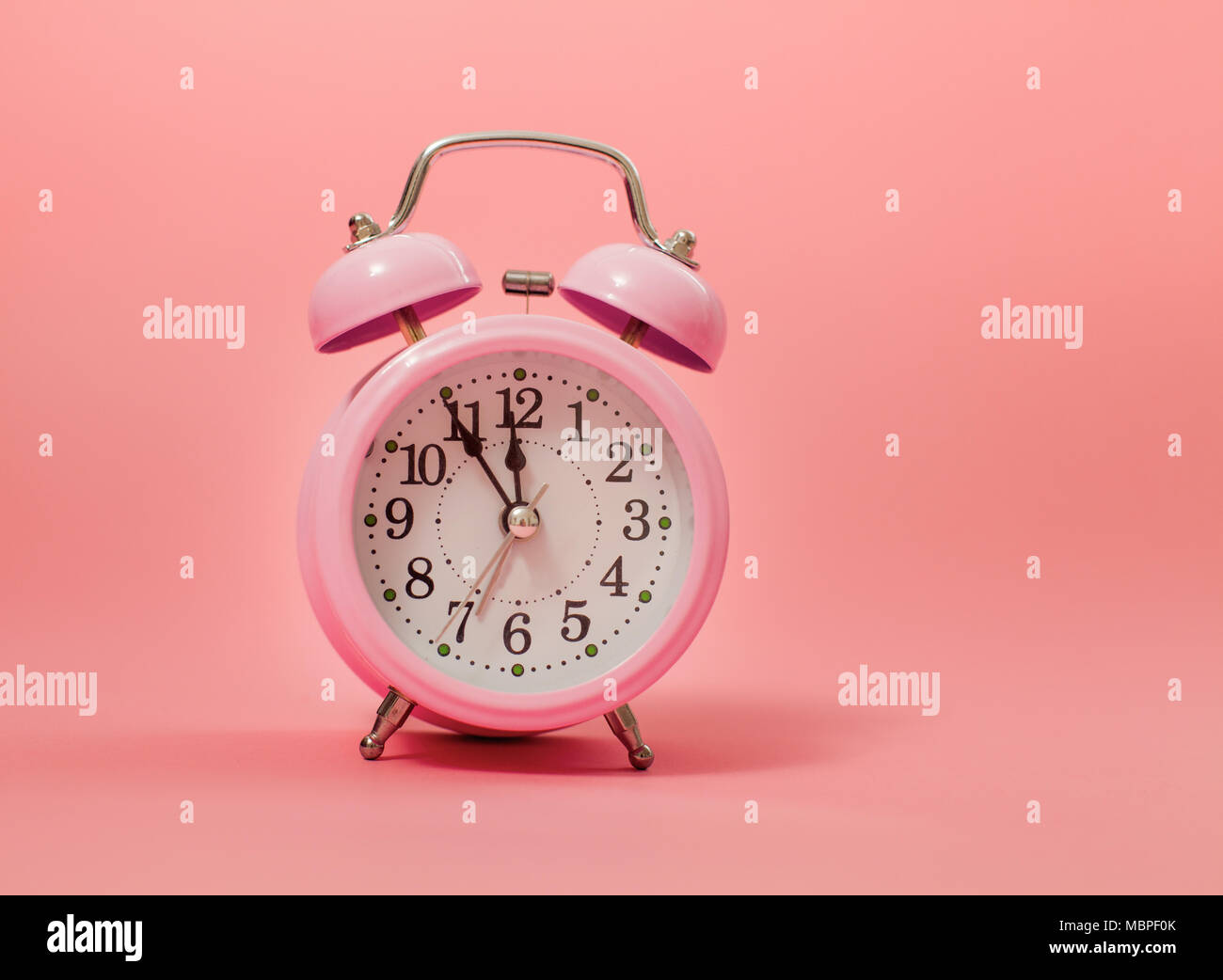 Alarm clock, vintage retro style time concept Stock Photo - Alamy