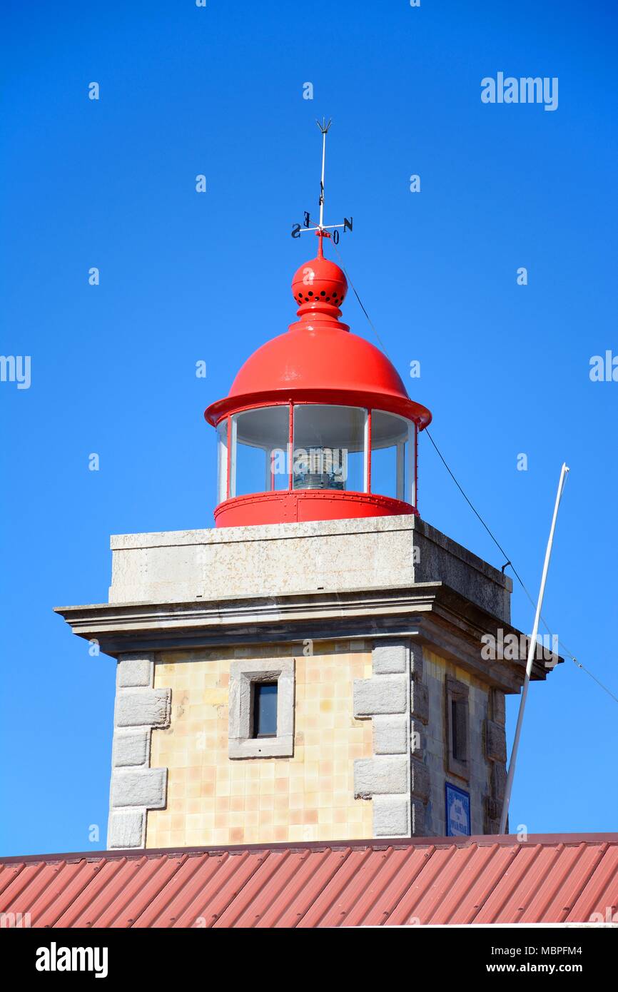 Top part of the lighthouse with its red painted top, Ponta da Piedade ...
