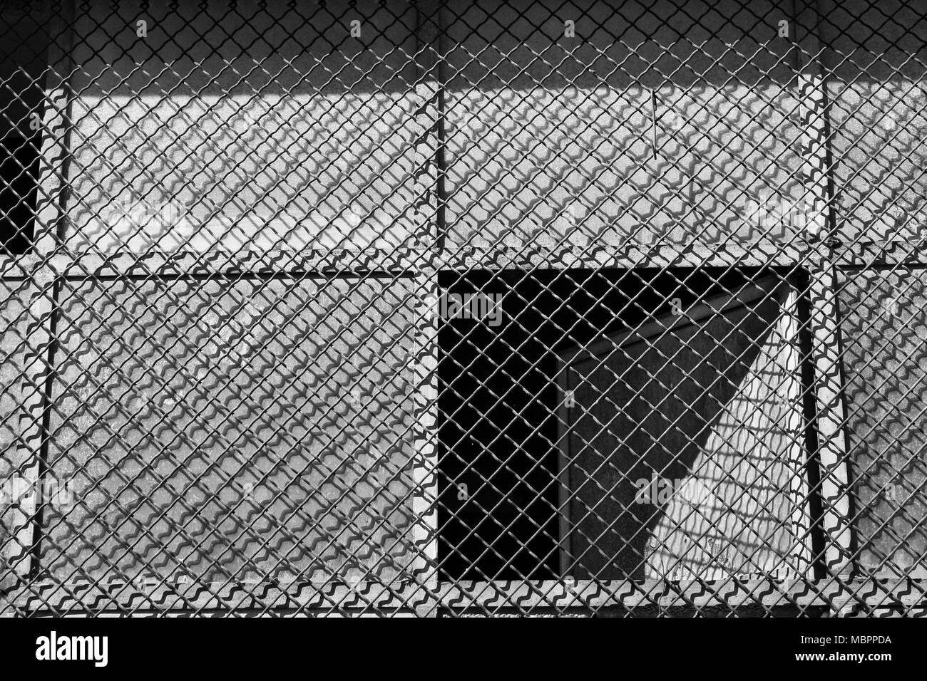 Window with metalized abstract and symmetrical grid texture Stock Photo ...