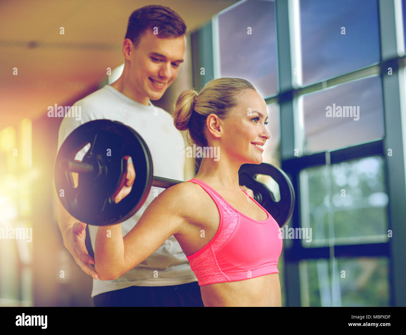 Man lifting gym smiling hi-res stock photography and images - Alamy