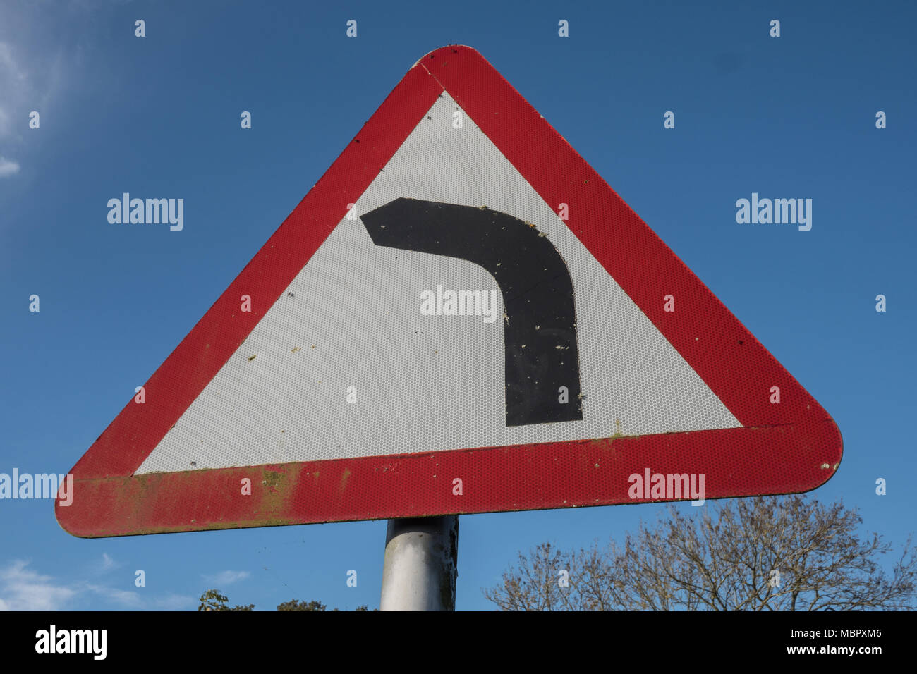 UK Traffic sign for a bend to the left. England UK Stock Photo - Alamy