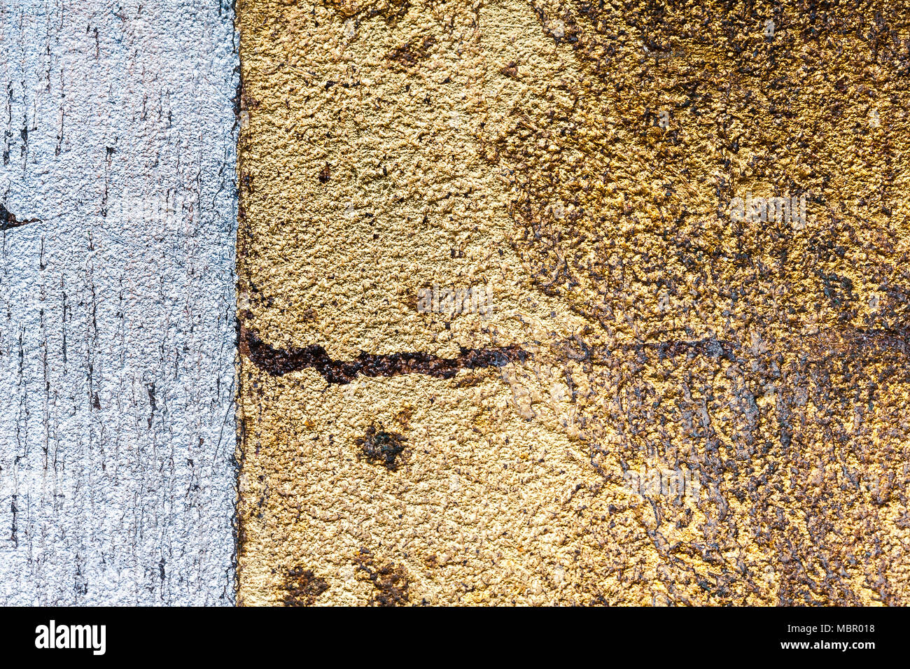 Silver with golden bumpy wall stucco texture background Stock Photo - Alamy