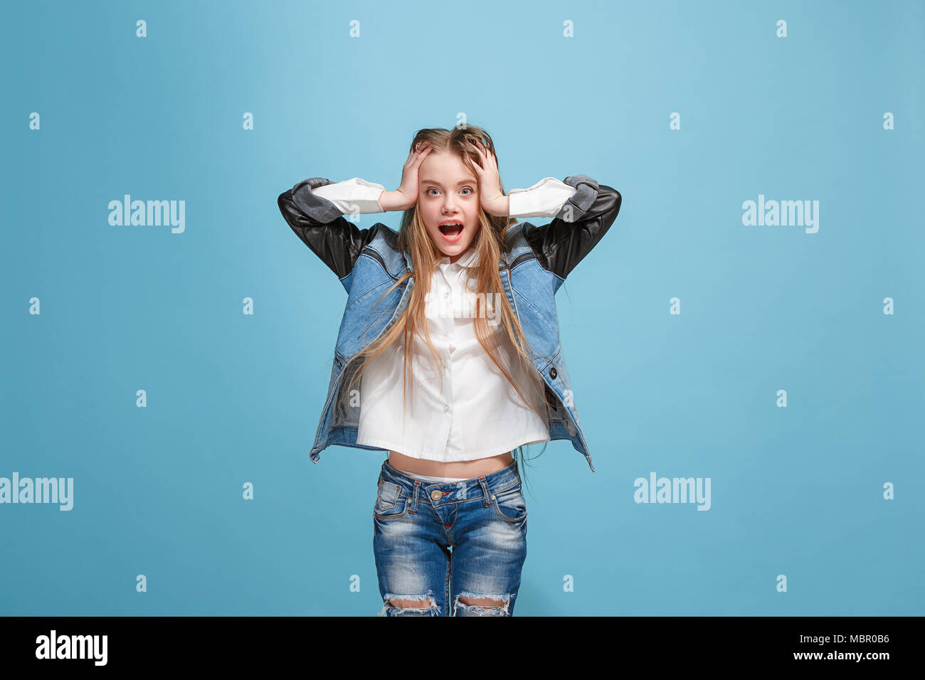 Happy success teen girl celebrating being a winner. Dynamic energetic ...