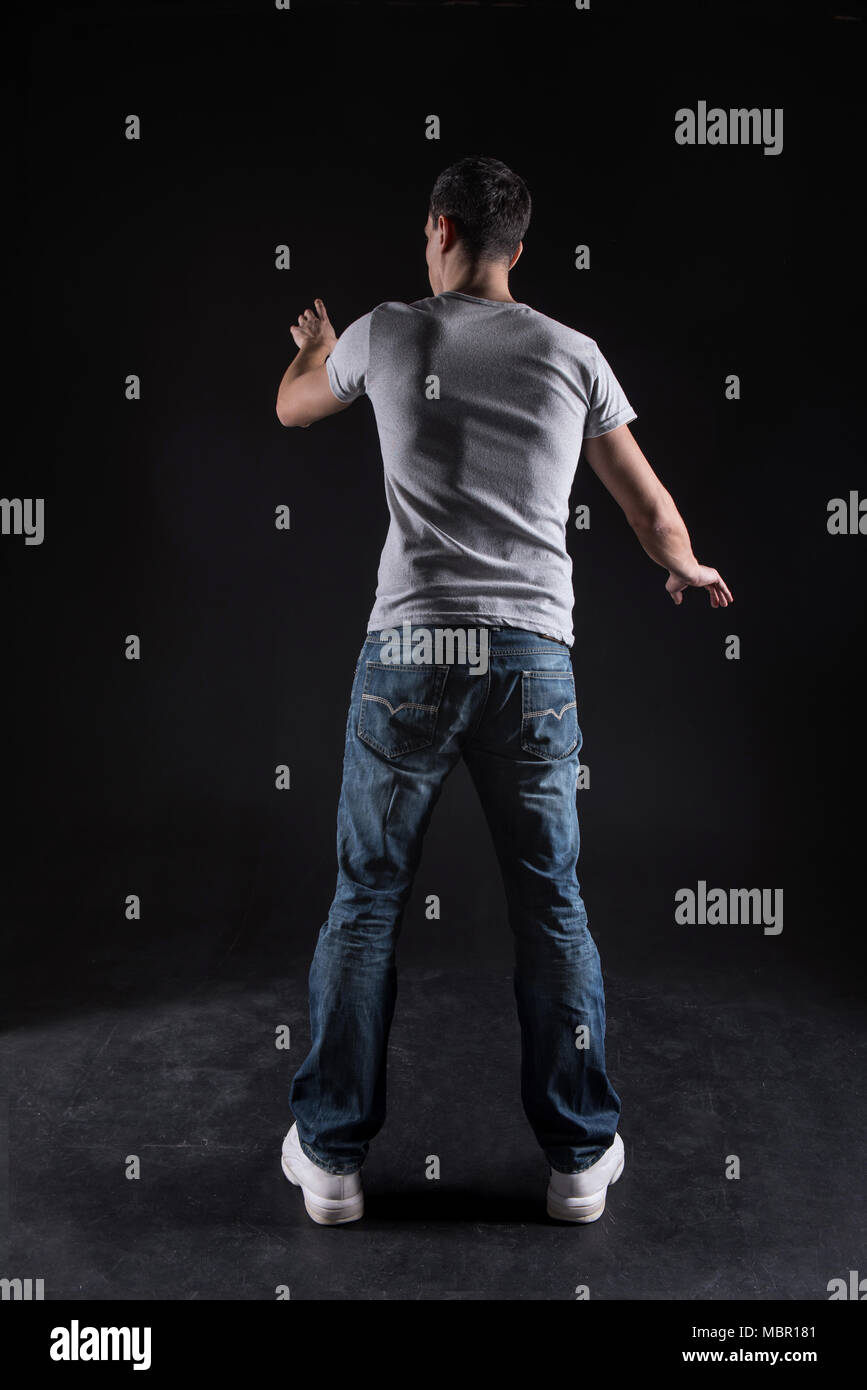 Smart young programmer multitasking Stock Photo - Alamy
