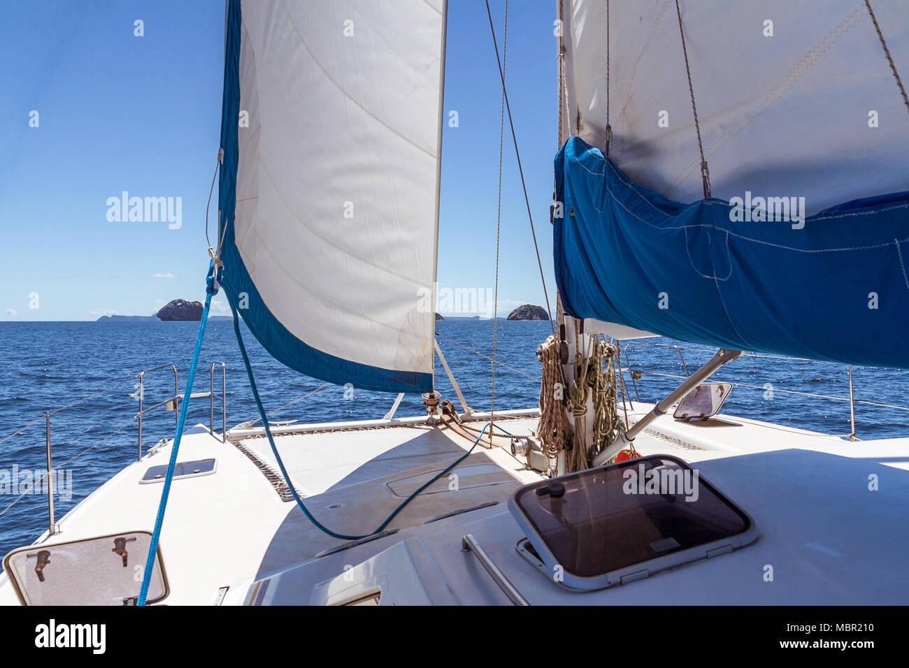 View of islands from the luxury white catamaran boat Stock Photo - Alamy