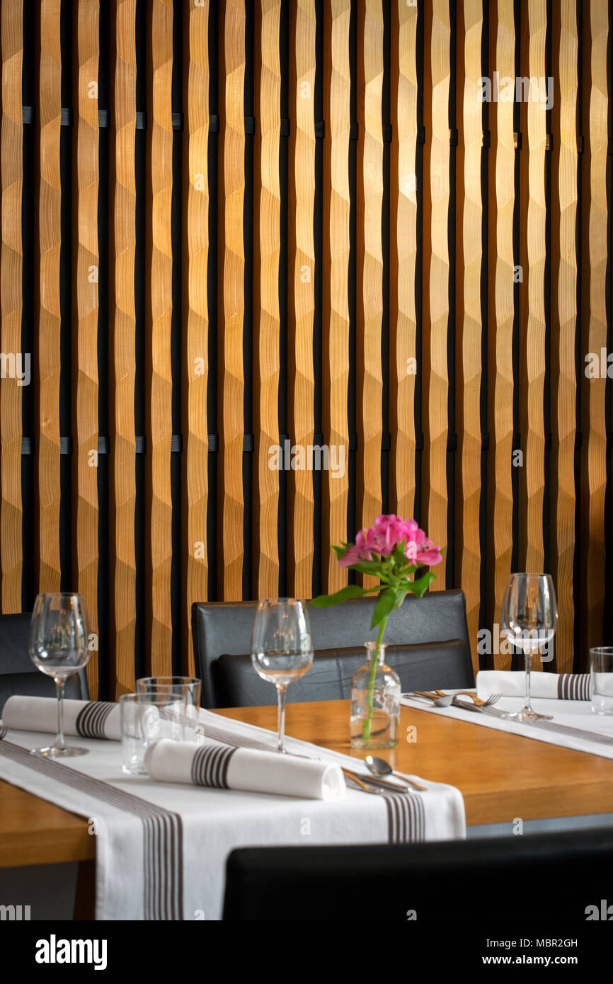 Wooden acoustic absorption panel of a restaurant dining room (France ...