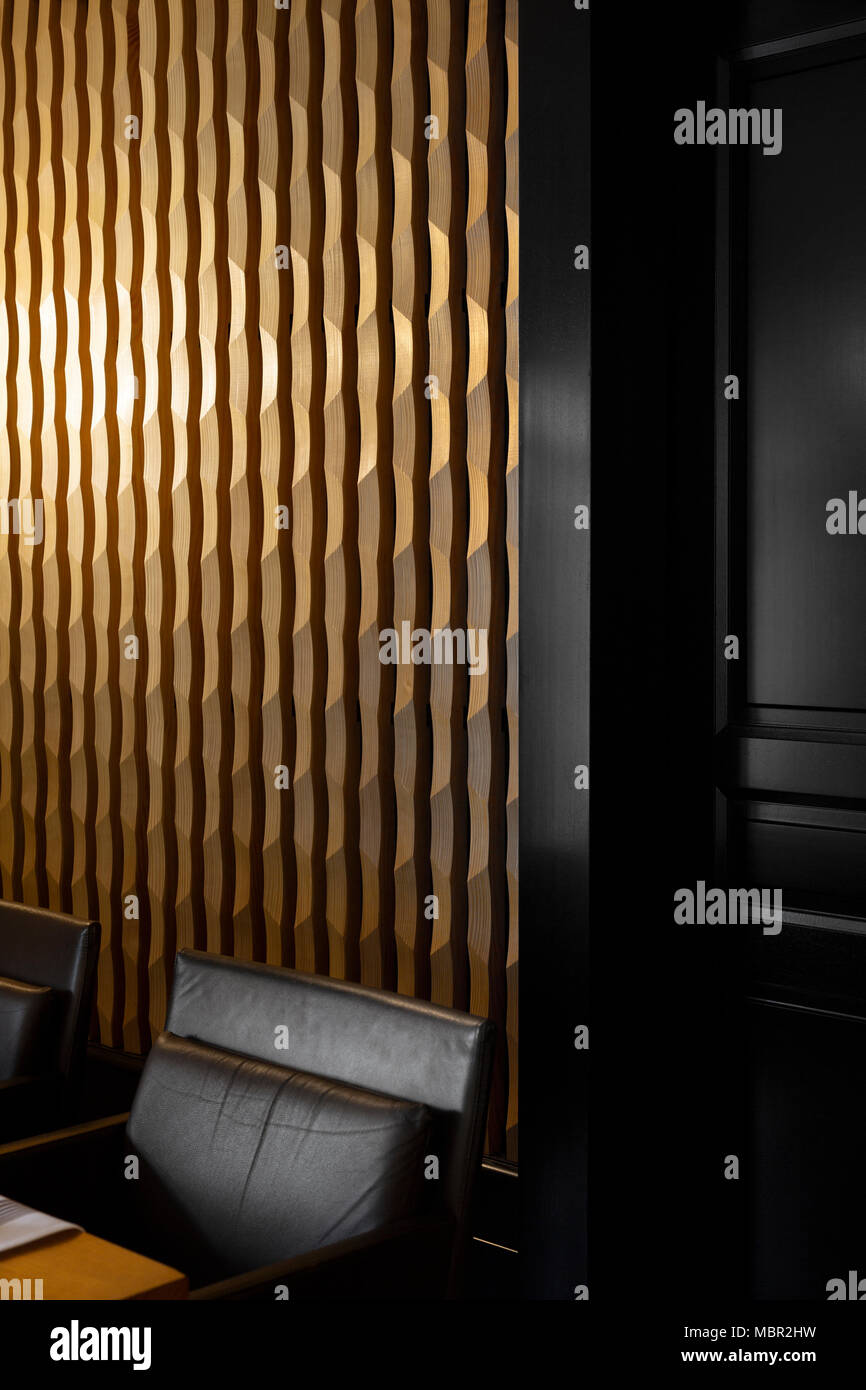 Wooden acoustic absorption panel of a restaurant dining room (France ...