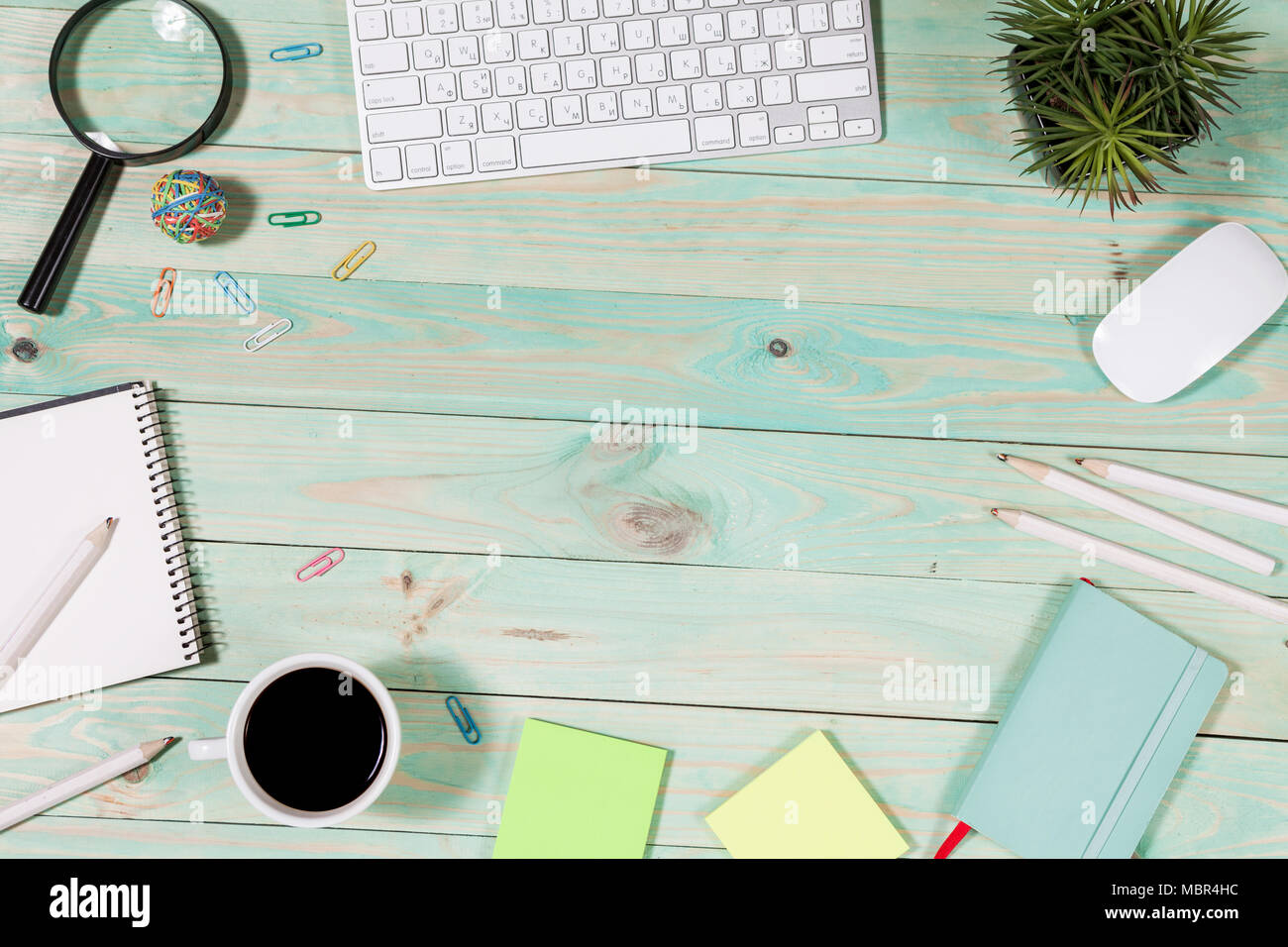 Office table desk with set of colorful supplies Stock Photo - Alamy