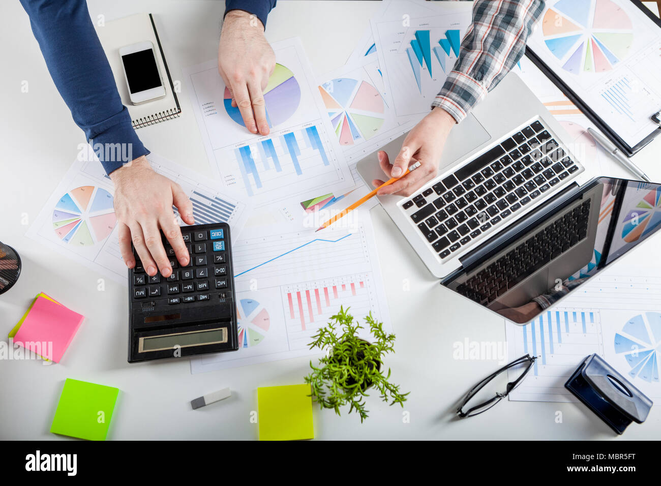 Stock market chart and finger pointing Stock Photo - Alamy