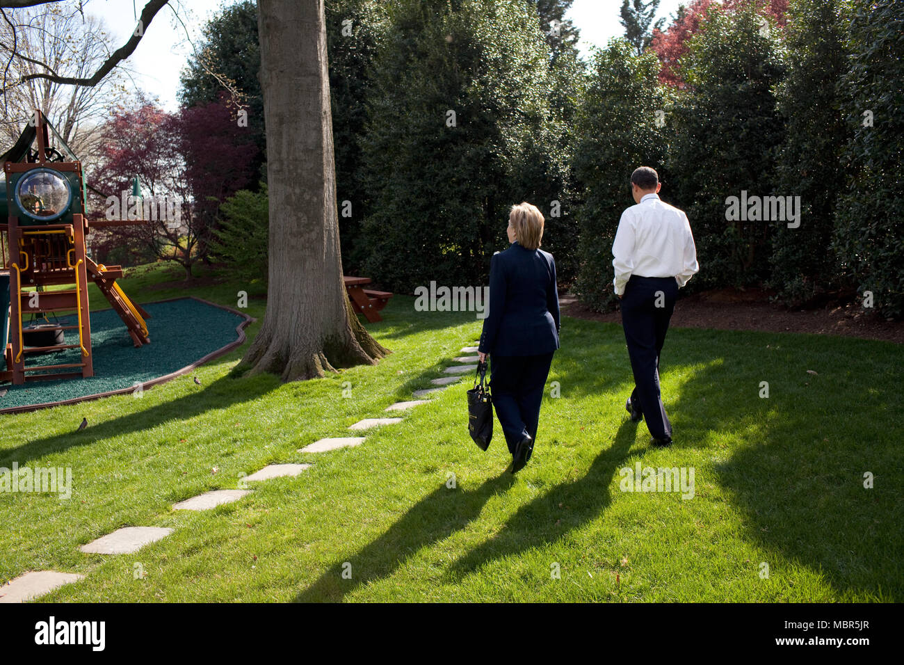 President Barack Obama walks with Secretary of State Hillary Rodham Clinton outside the Oval ...