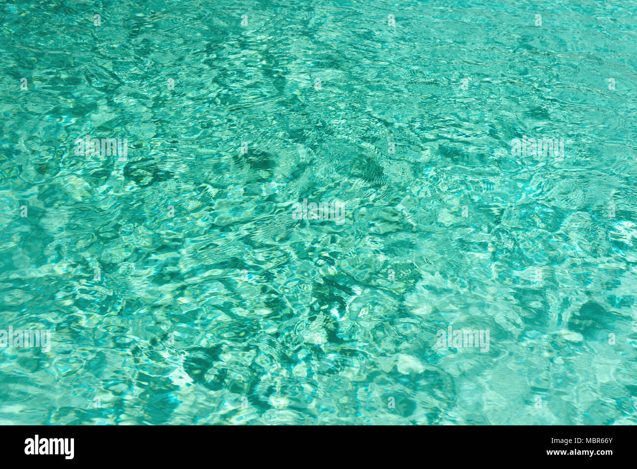 Close up abstract water texture. Turquoise swimming pool water ...