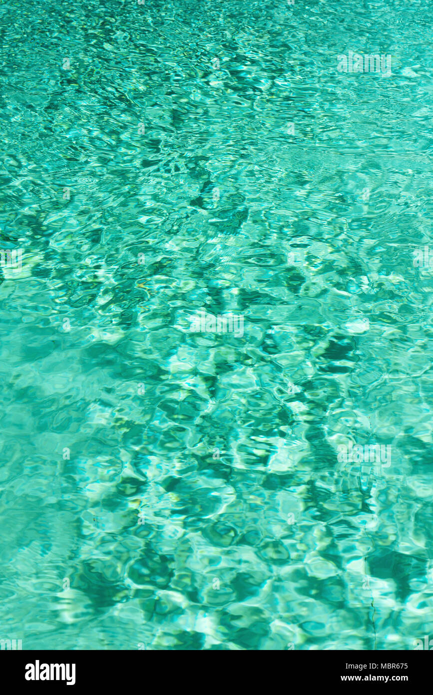 Close up abstract water texture. Turquoise swimming pool water ...