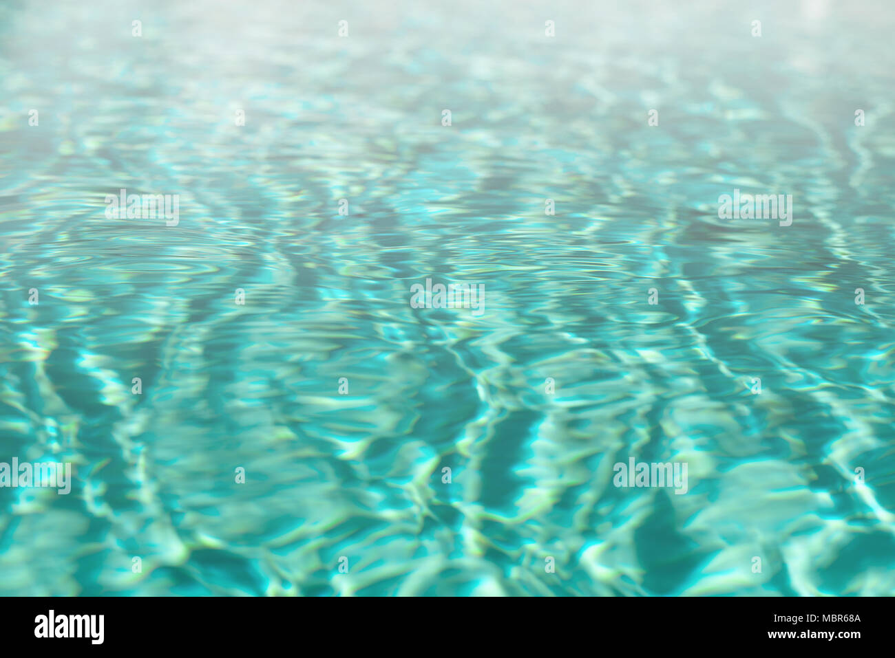 Close up abstract water texture. Turquoise swimming pool water ...