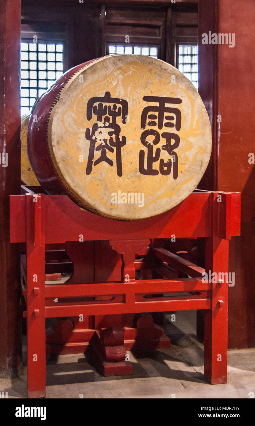 Beijing, China - April 26, 2010: Closeup of historic yellow-brown drum ...