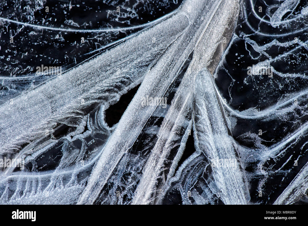 Abstract patterns in ice Stock Photo - Alamy