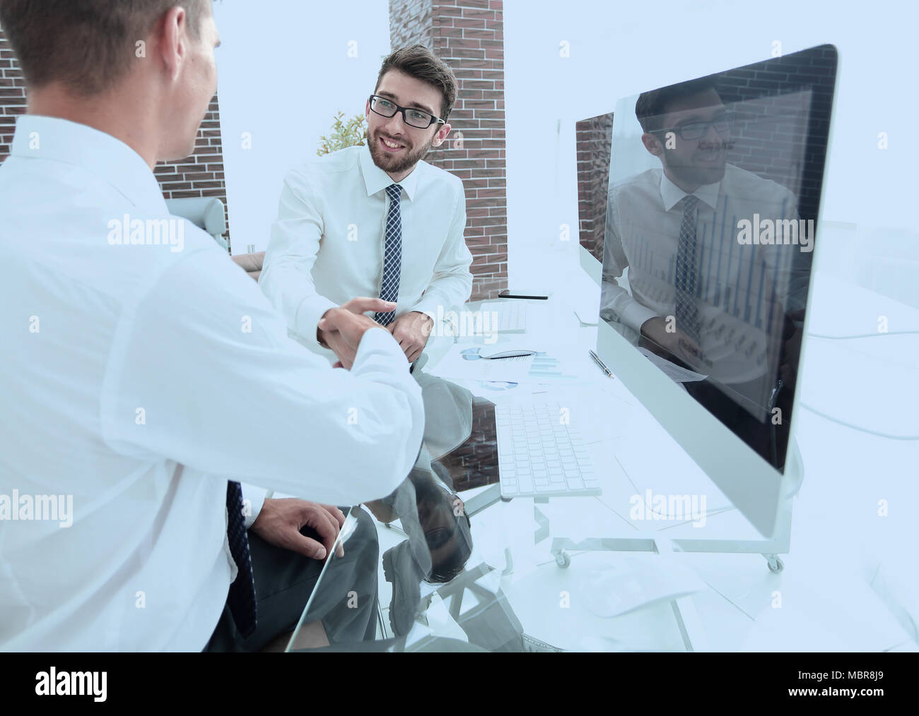 handshake of a businessman and accountant Stock Photo - Alamy
