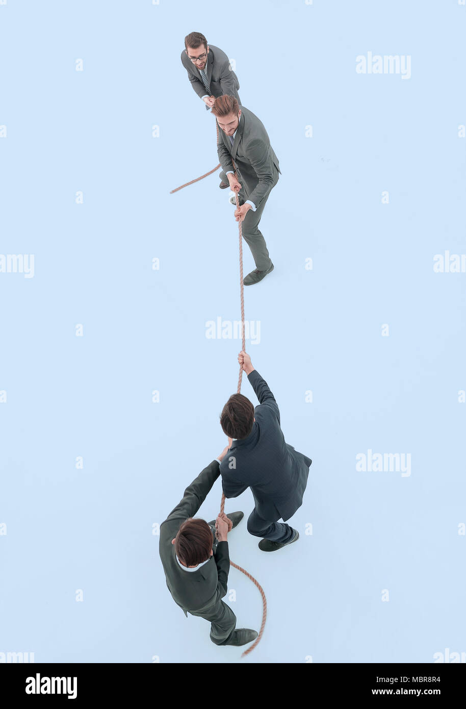 top view.the tug of war between business people Stock Photo - Alamy