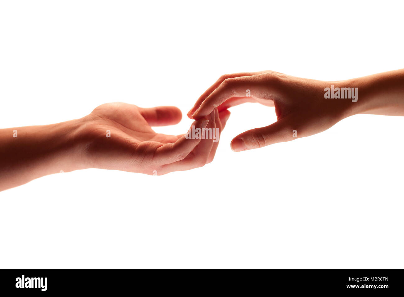Touching hands - warm mood Stock Photo - Alamy