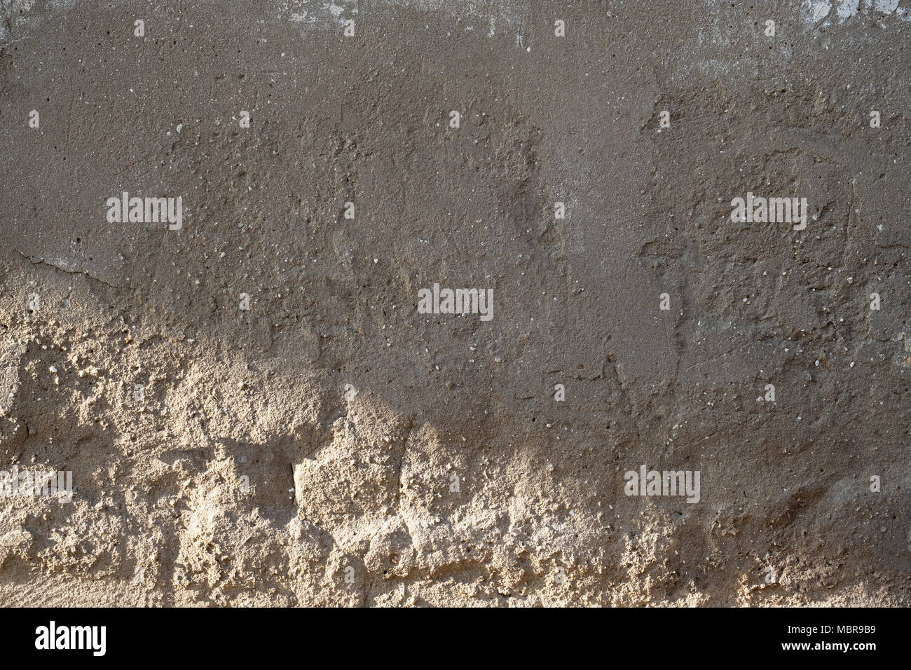 Texture of old gray concrete wall for background half lit by sun, room ...