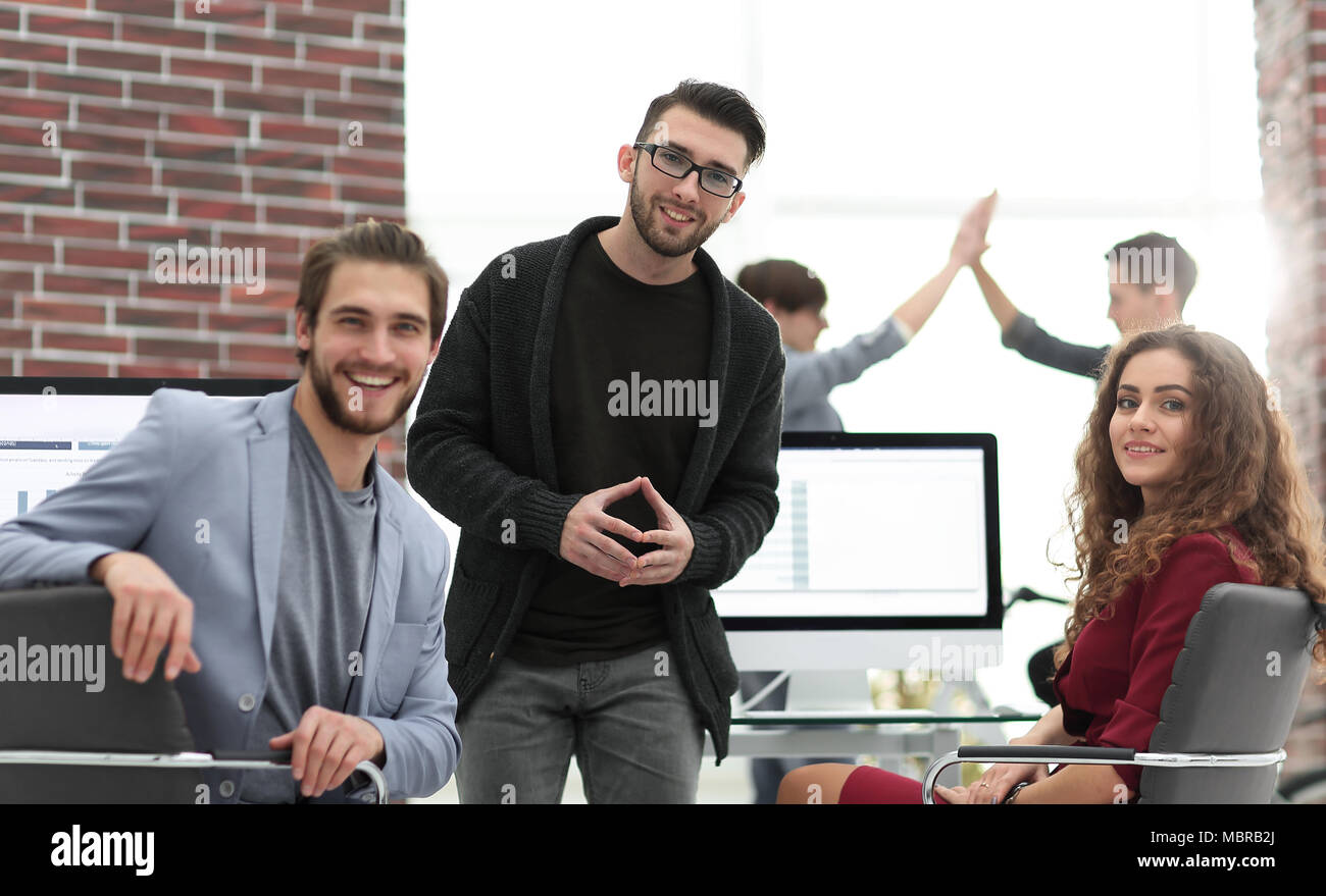 cheerful colleagues in the workplace Stock Photo - Alamy