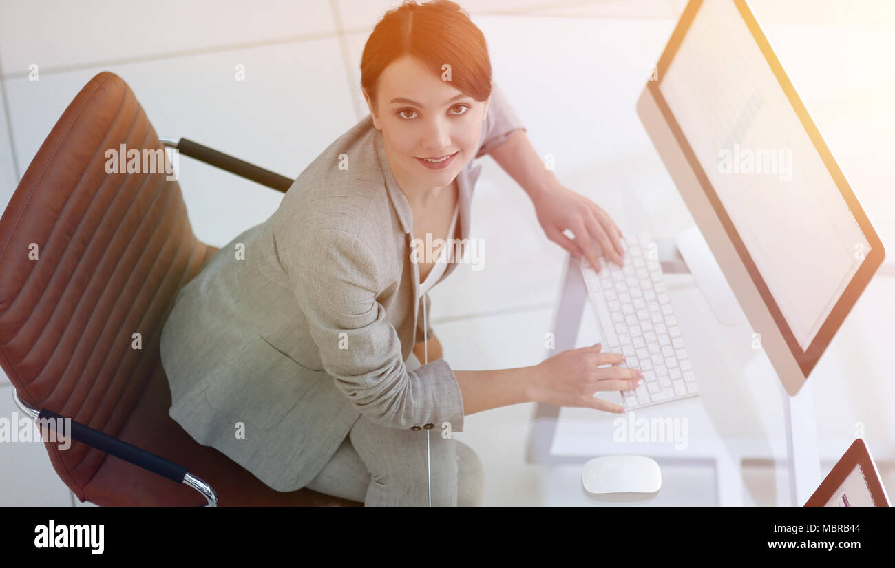 staff of the planning Department sitting behind a Desk and looking at ...