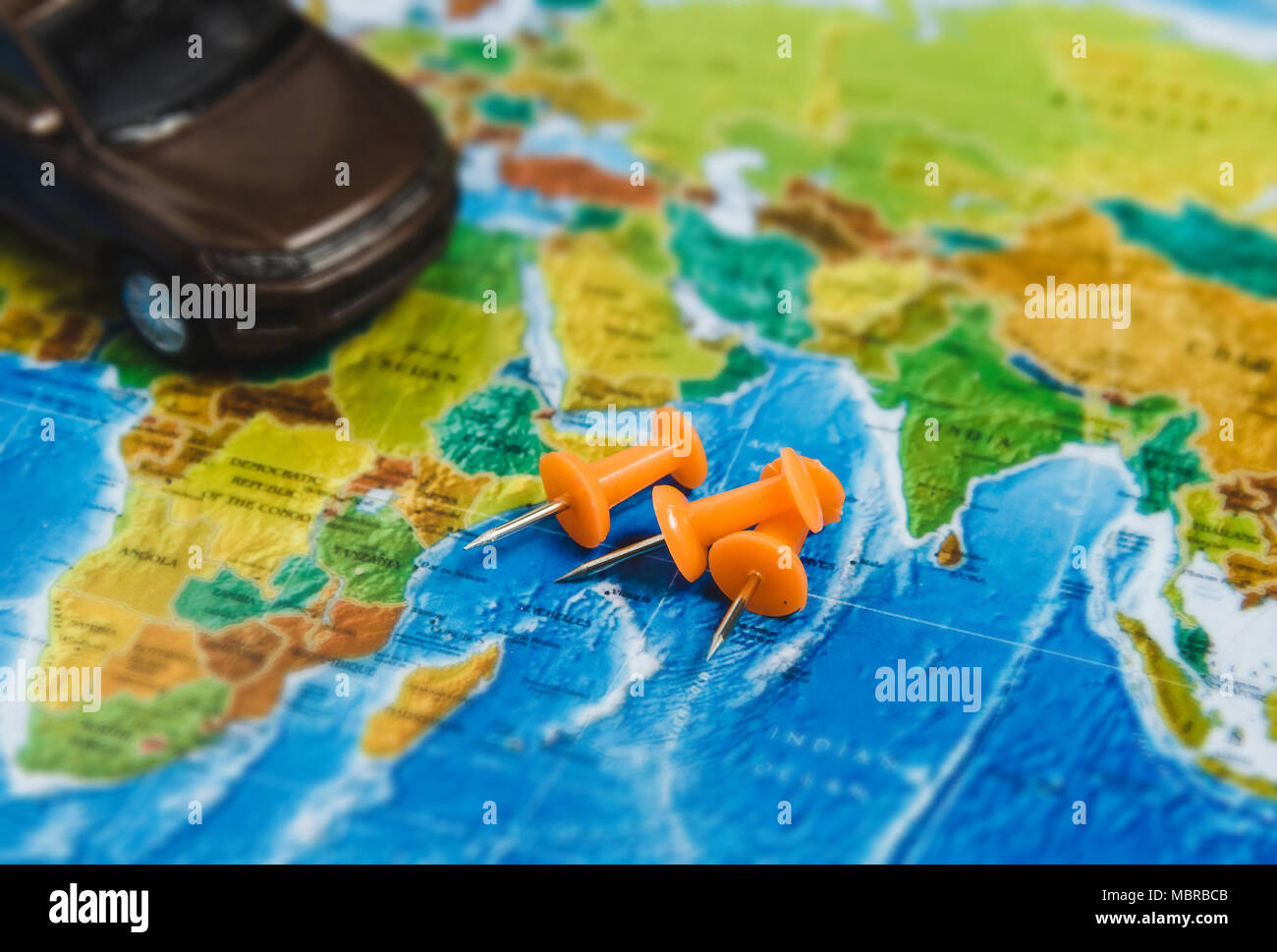 travel destination points on a map indicated with colorful thumbtacks ...