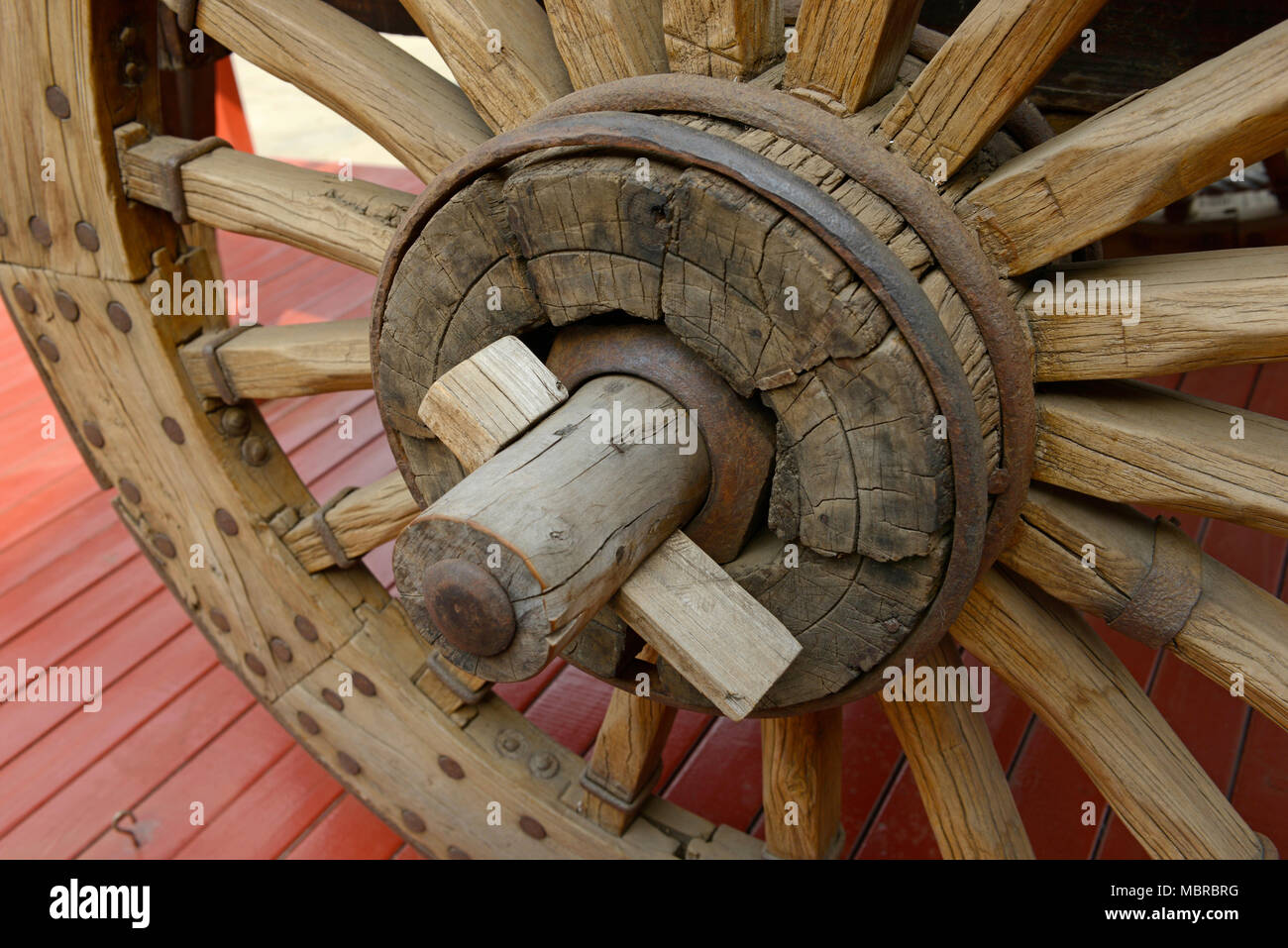 Wheel of a replica traditional horse-drawn wooden cart in Donyue temple ...