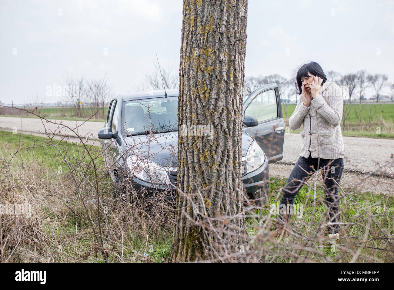 Woman calling helpline hi-res stock photography and images - Alamy
